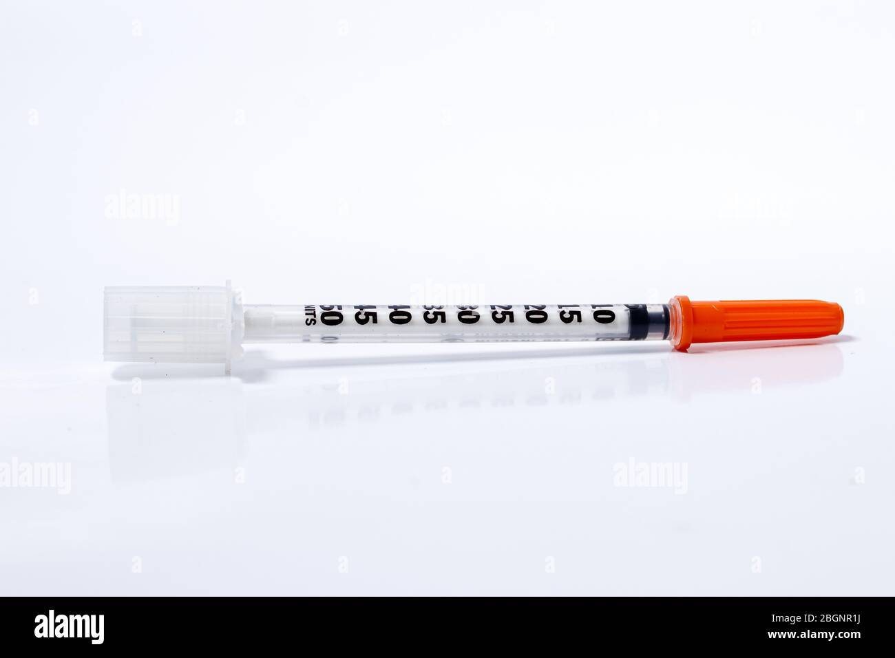 syringe over white background Stock Photo - Alamy