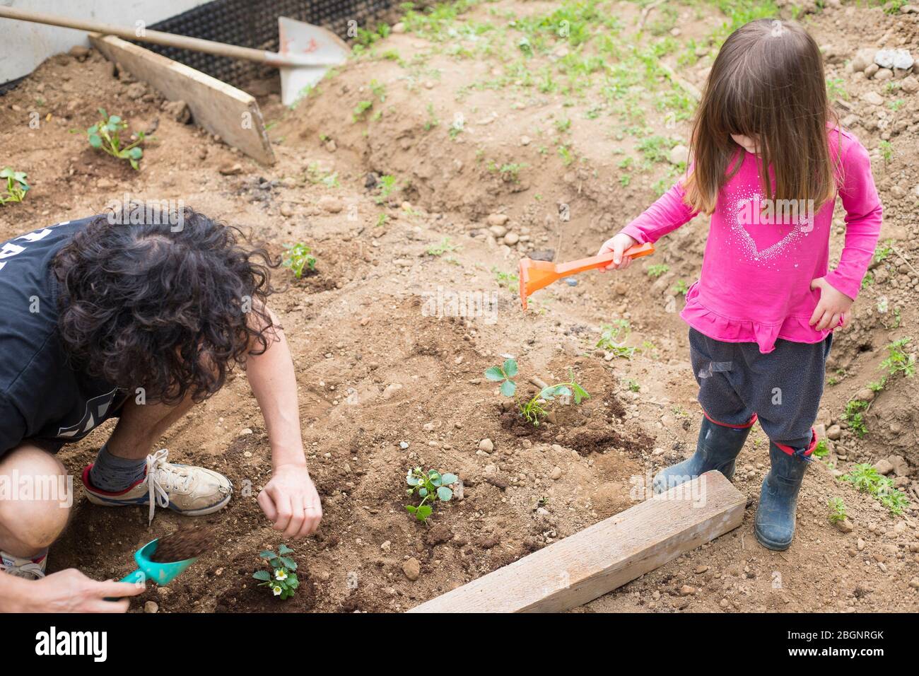 Girl digging hi-res stock photography and images - Alamy