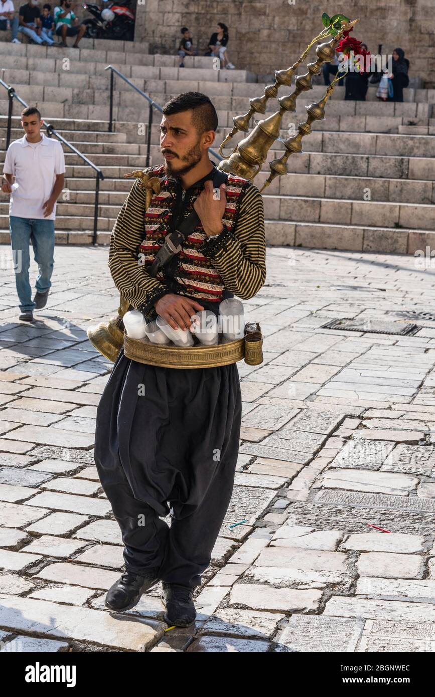 Israel, Jerusalem, East Jerusalem, A Palestinian Arab man with his ...