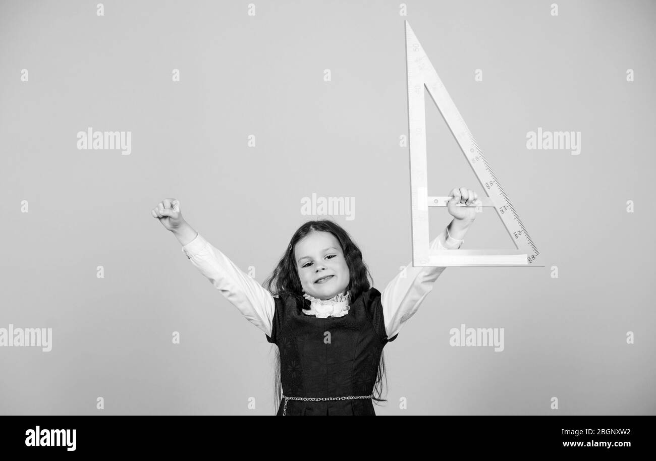 Kid school uniform hold ruler. School education concept. Learn ...