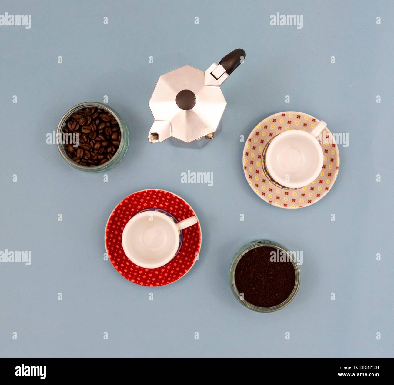 Coffee pot with espresso cups and coffee beans Stock Photo - Alamy