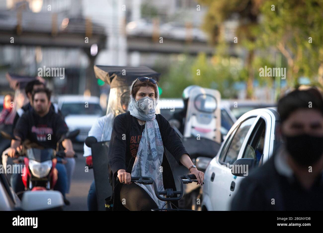 Woman in medical mask rides hi-res stock photography and images - Alamy