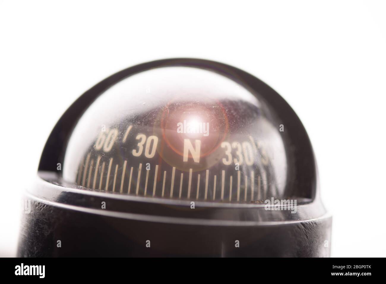 A big compass on a boat showing direction close up Stock Photo - Alamy