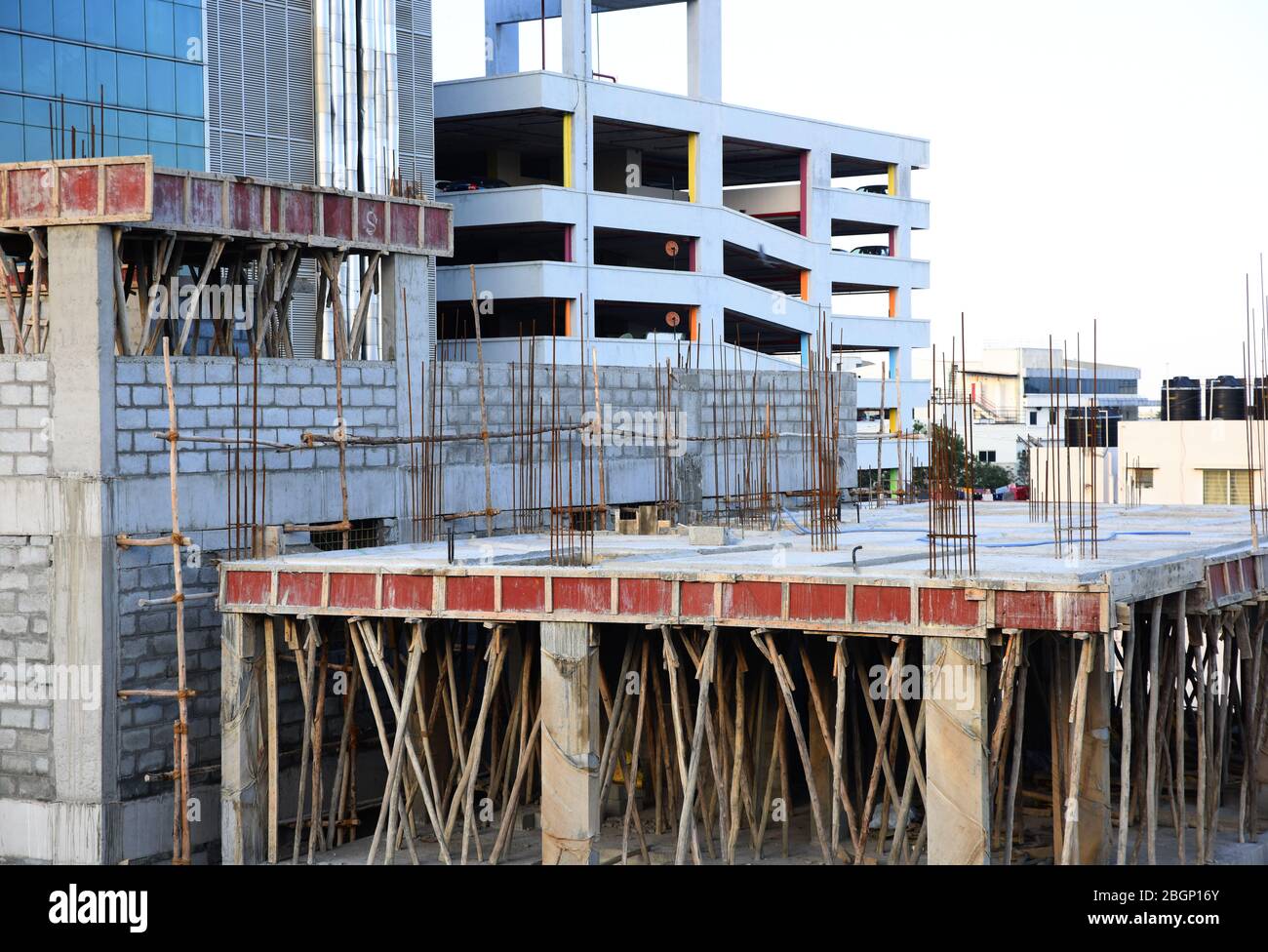 Building under construction in a city Stock Photo - Alamy