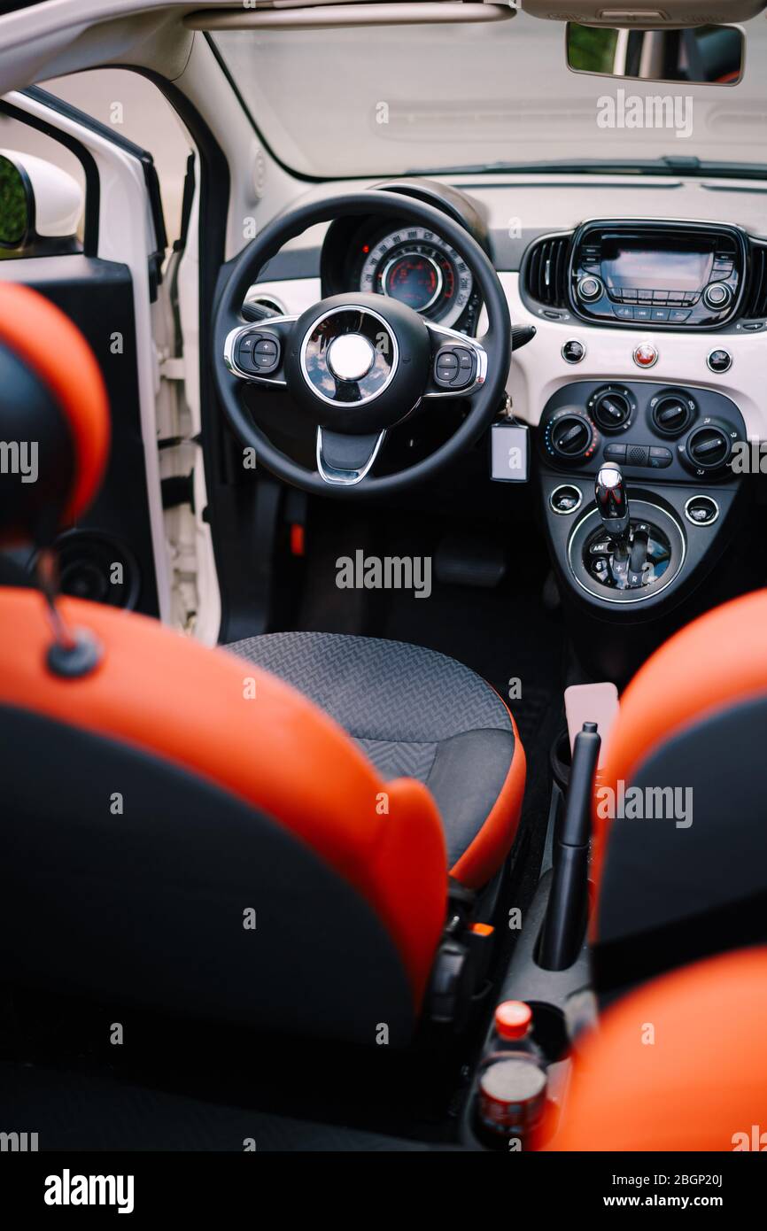 The interior of the convertible car. Inside a small convertible car ...