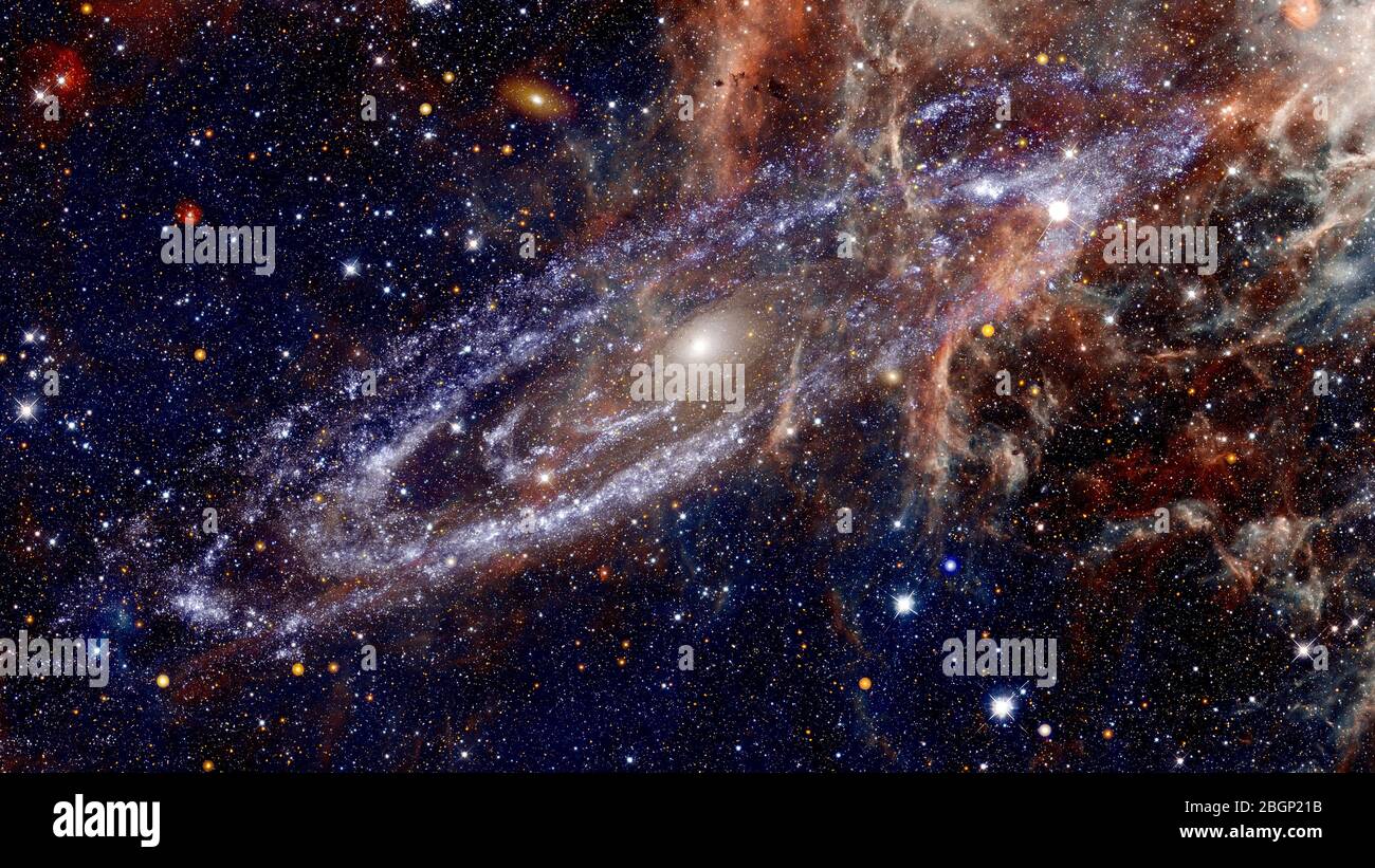 Giant spiral disk of stars, dust and gas. Elements of this image ...