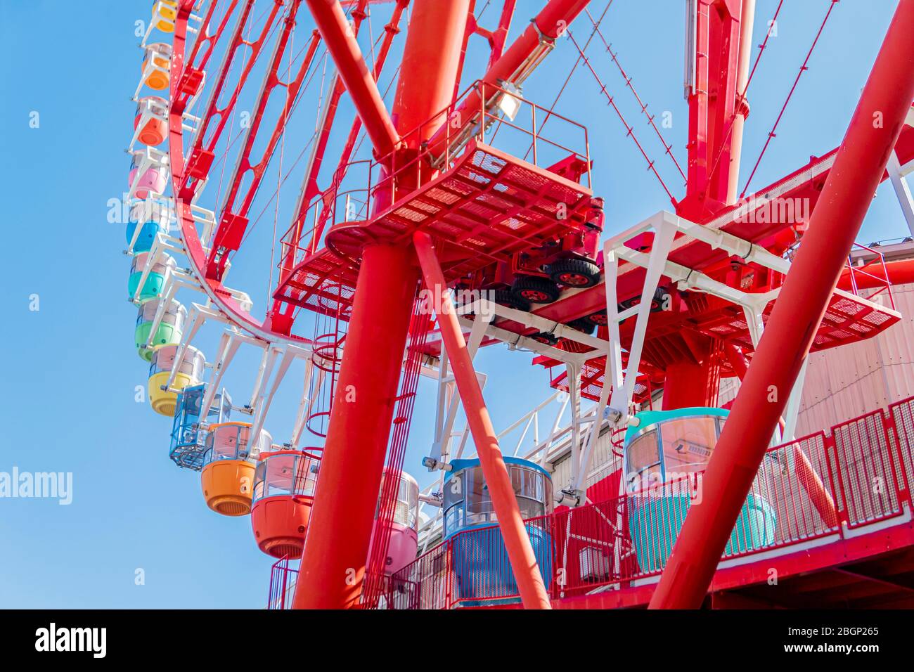 The Giant ferris wheel with its colorful gongolas at Mori buildiing ...
