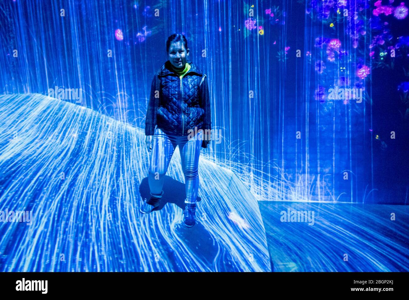 Interactive light effect as the waterfall and river at teamLab ...