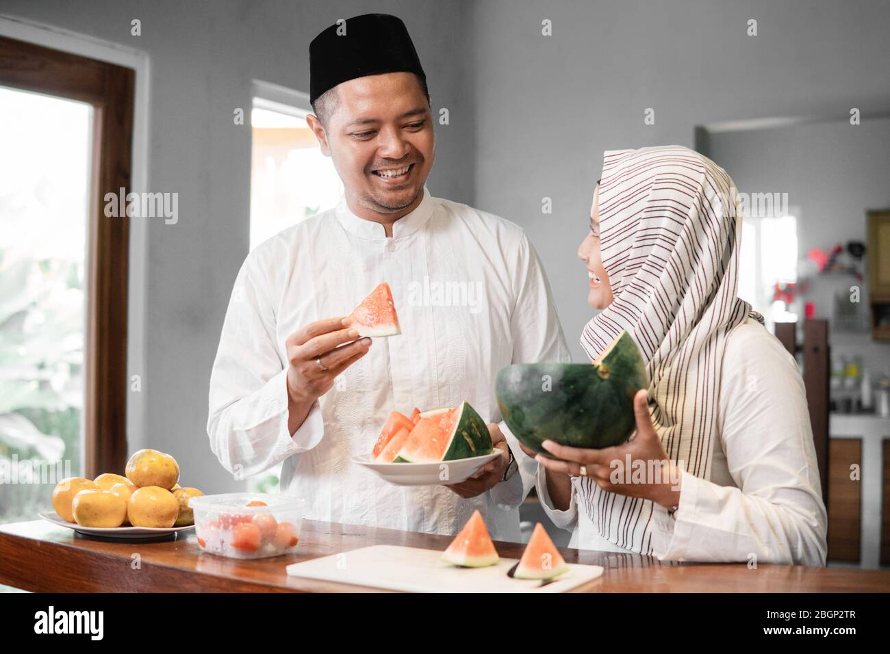 muslim couple preparing for breaking the fast on ramadan month Stock ...