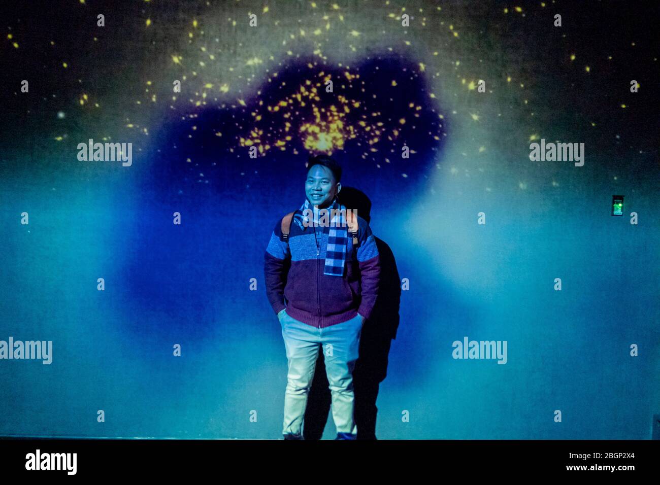 Projector and reflecting light effect art as firework at teamLab ...