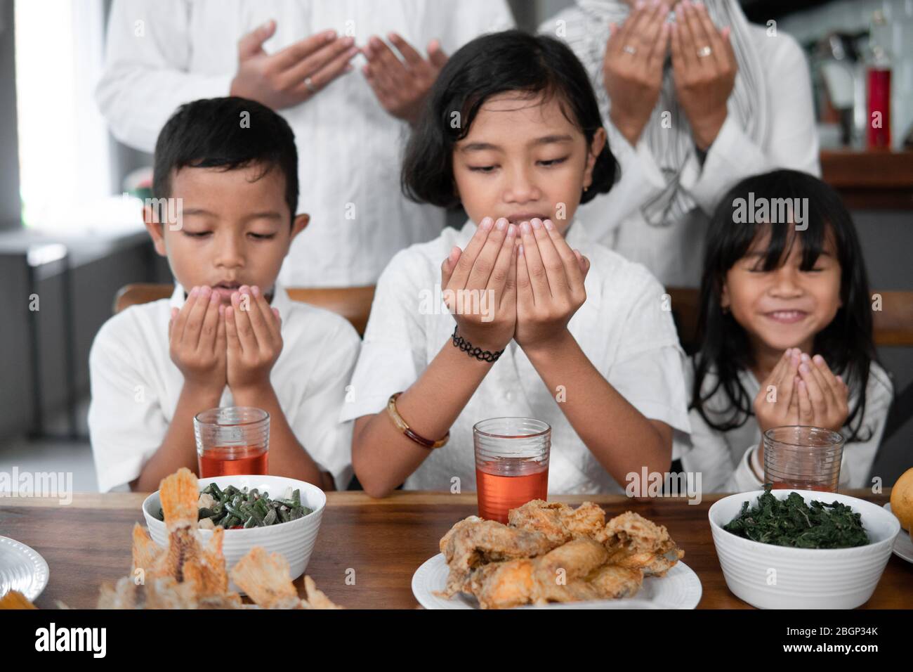 asian children pray muslim open arm before eating dinner Stock Photo ...