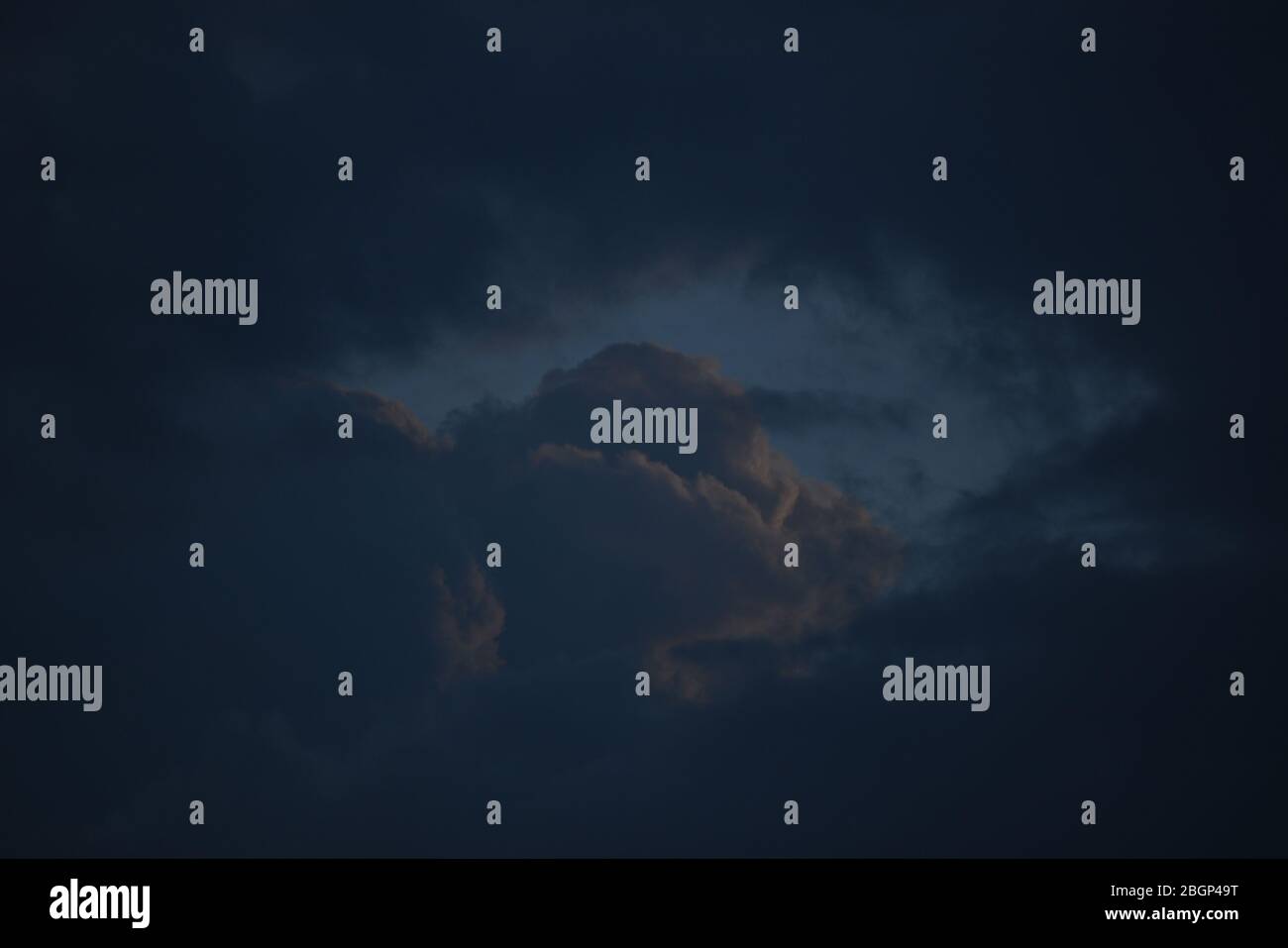 Dramatic sunrise and rainy storm sky with dark cloud.Abstract nature background.April 2020 Stock ...