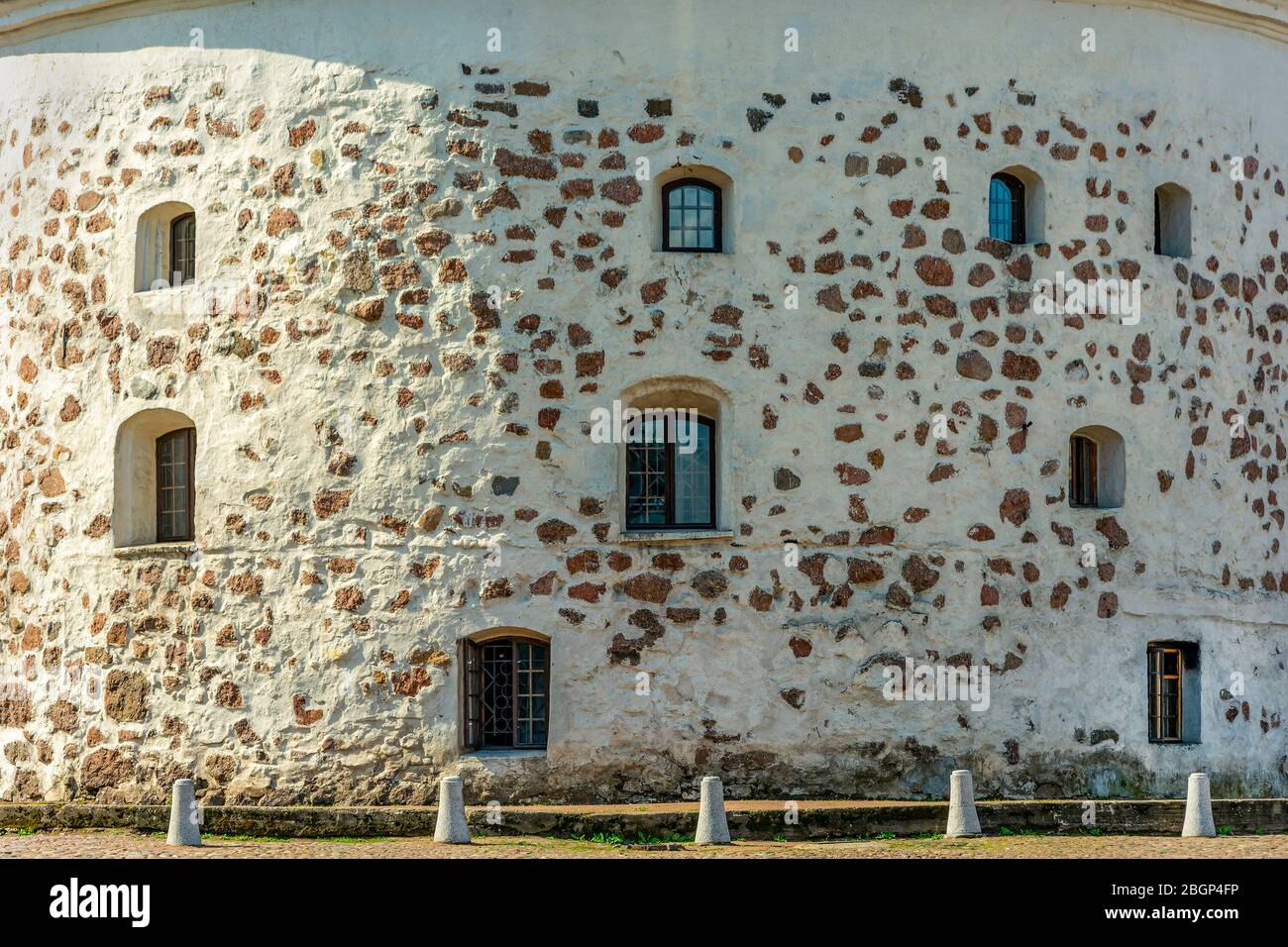 Vyborg, a fragment of an ancient wall, a Round tower, a popular tourist ...