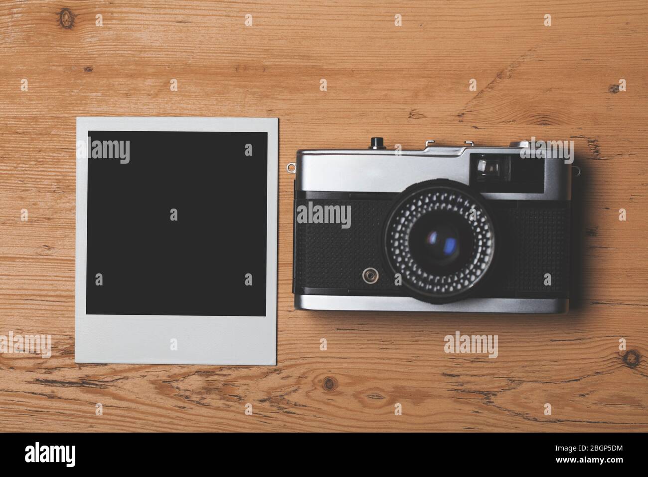 vintage retro camera with a blank instant photograph frame Stock Photo ...