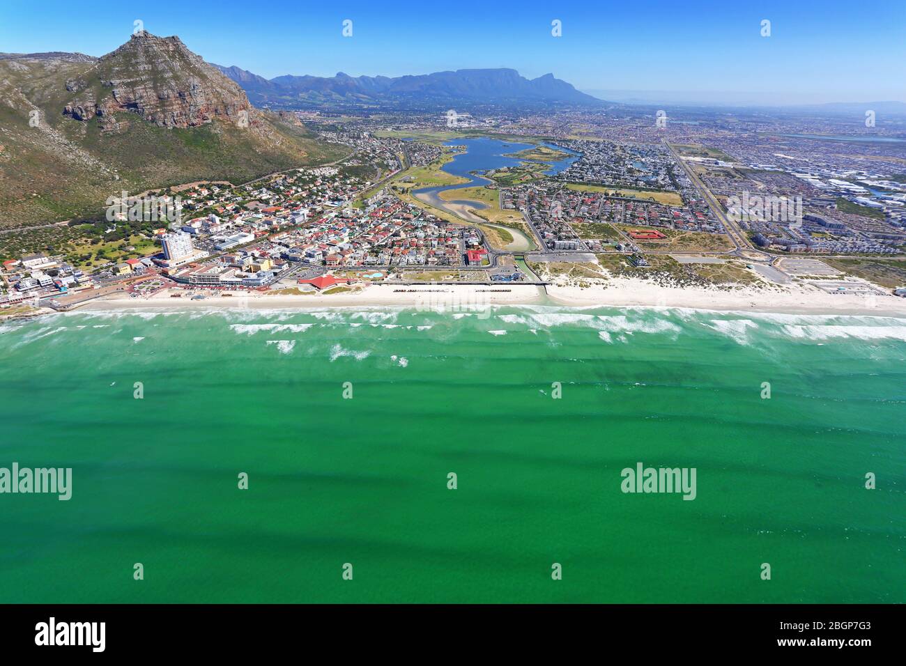 Aerial photo of Muizenberg Beach with Table Mountain in the background ...