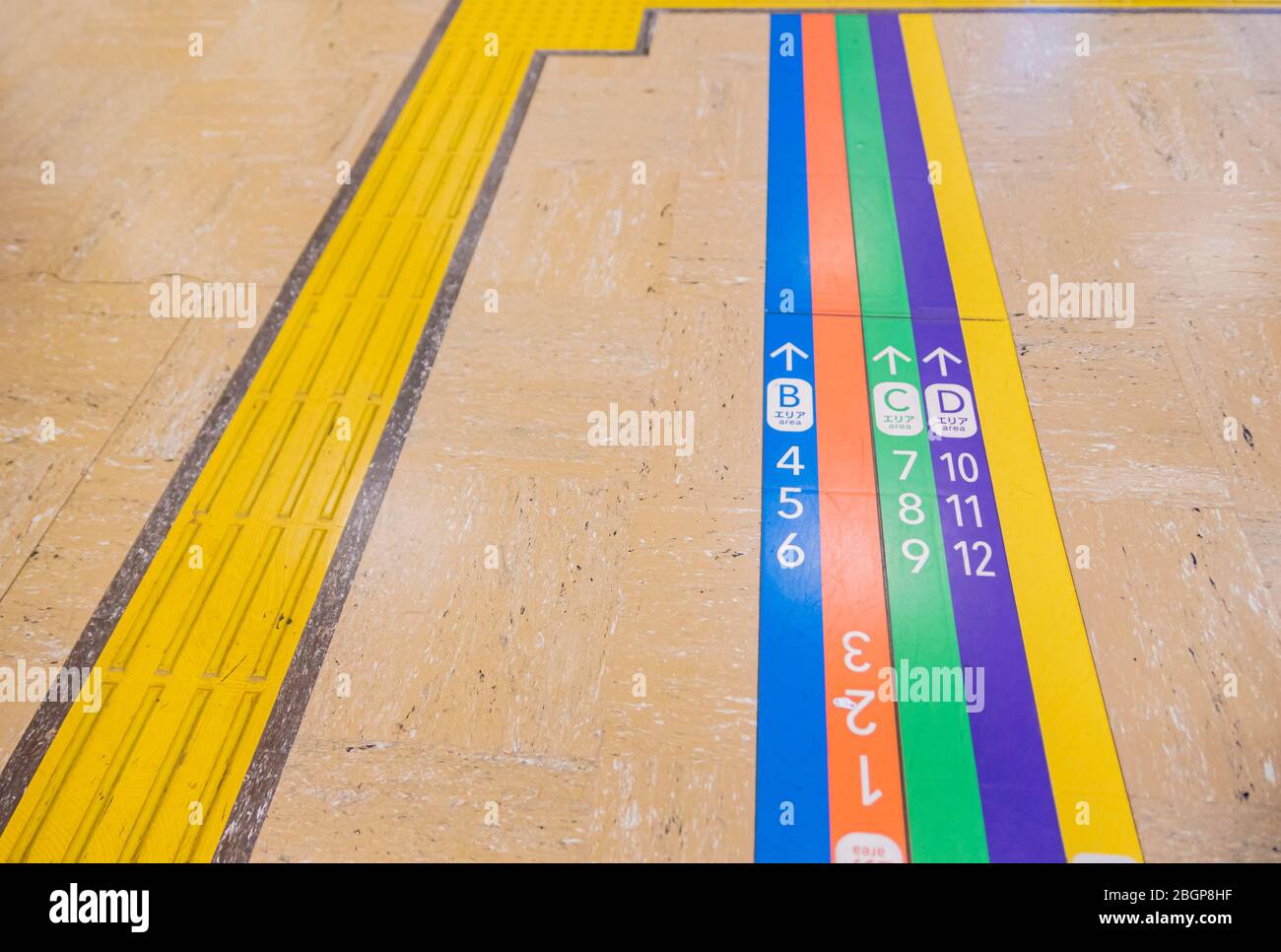 Direction guide label on the floor ofShinjuku expressway bus terminal ...