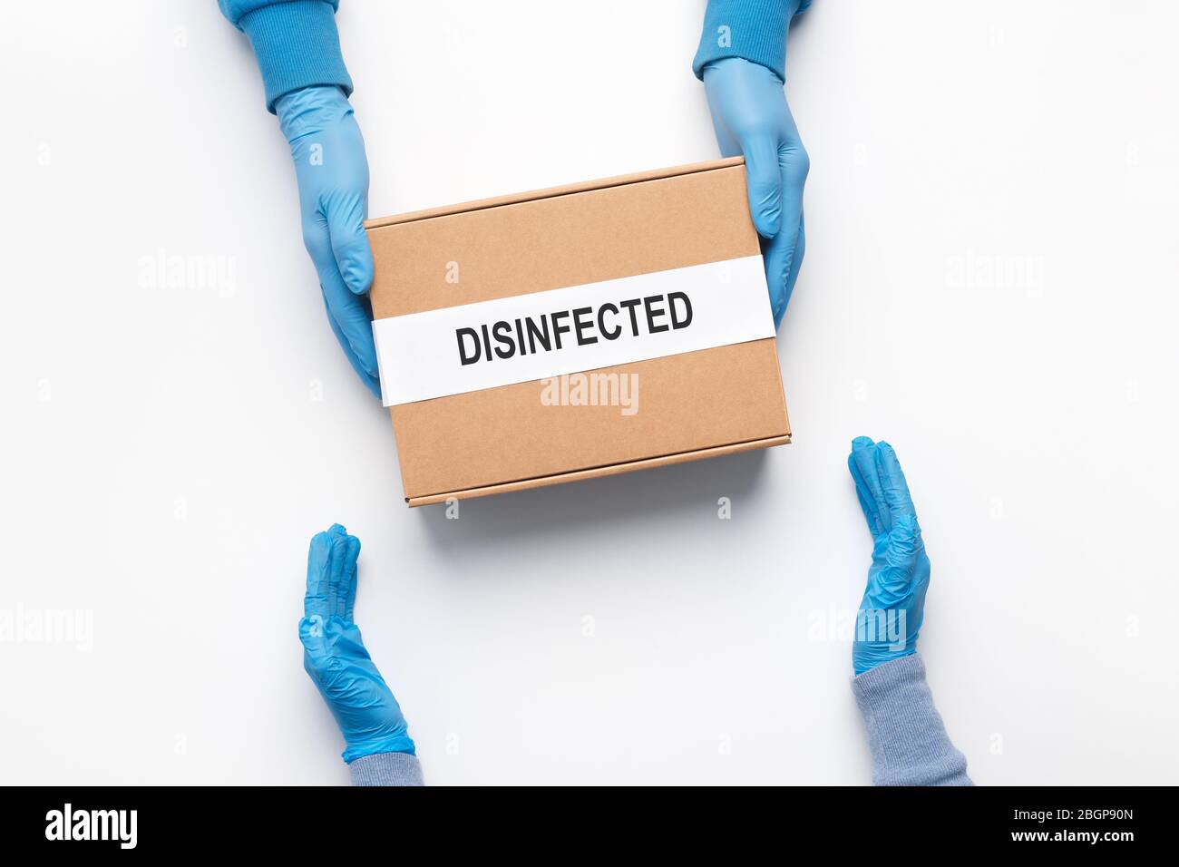 Package transfer from delivery man in medical gloves to customer Stock ...