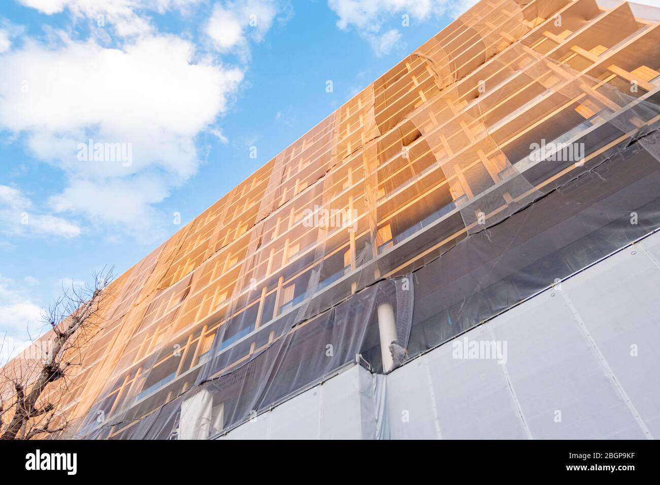 The net covers underconstruction building Stock Photo - Alamy