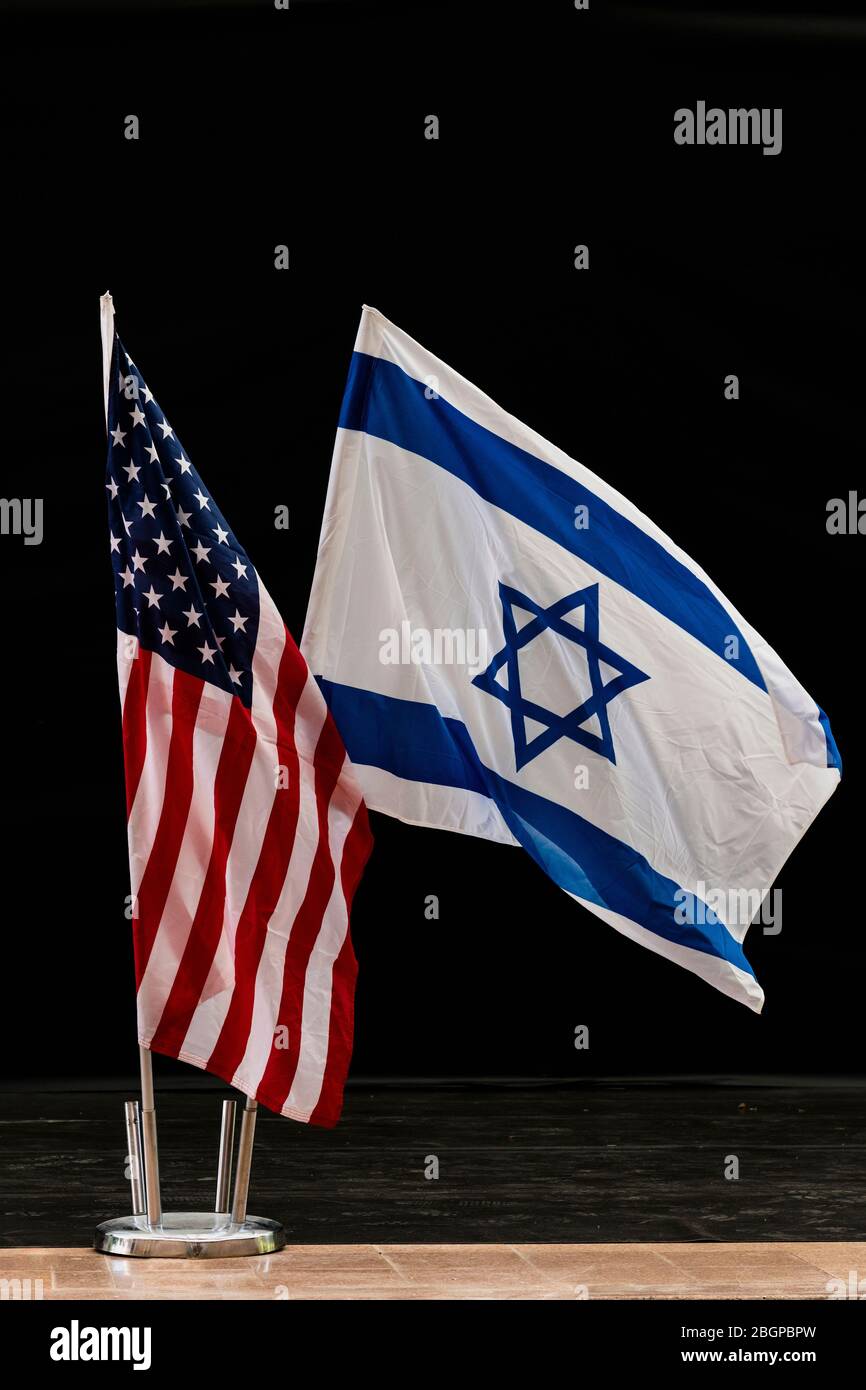 Israel, Netanya, An Israeli and a U.S. flag displayed together as a ...