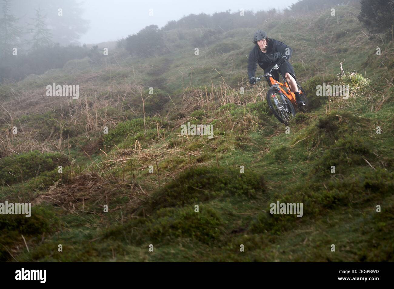 Man riding bike in mountains wales hi-res stock photography and images ...