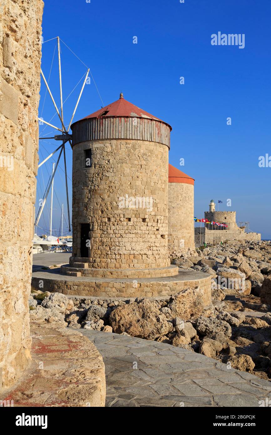 Windmills in Mandraki Harbor, Port of Rhodes, Greece, Europe Stock ...