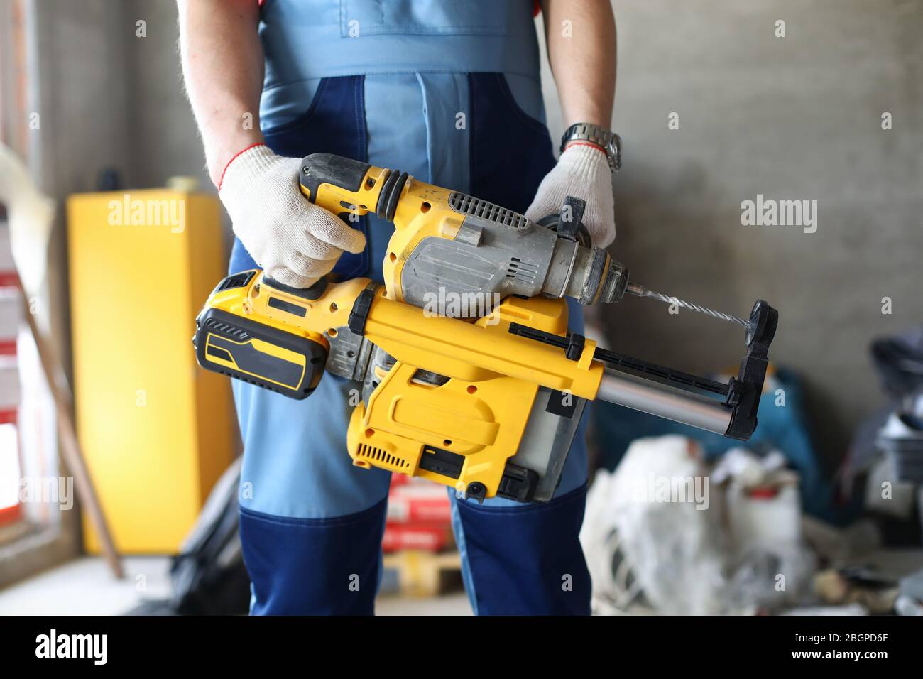 Builder holding drill hi-res stock photography and images - Alamy