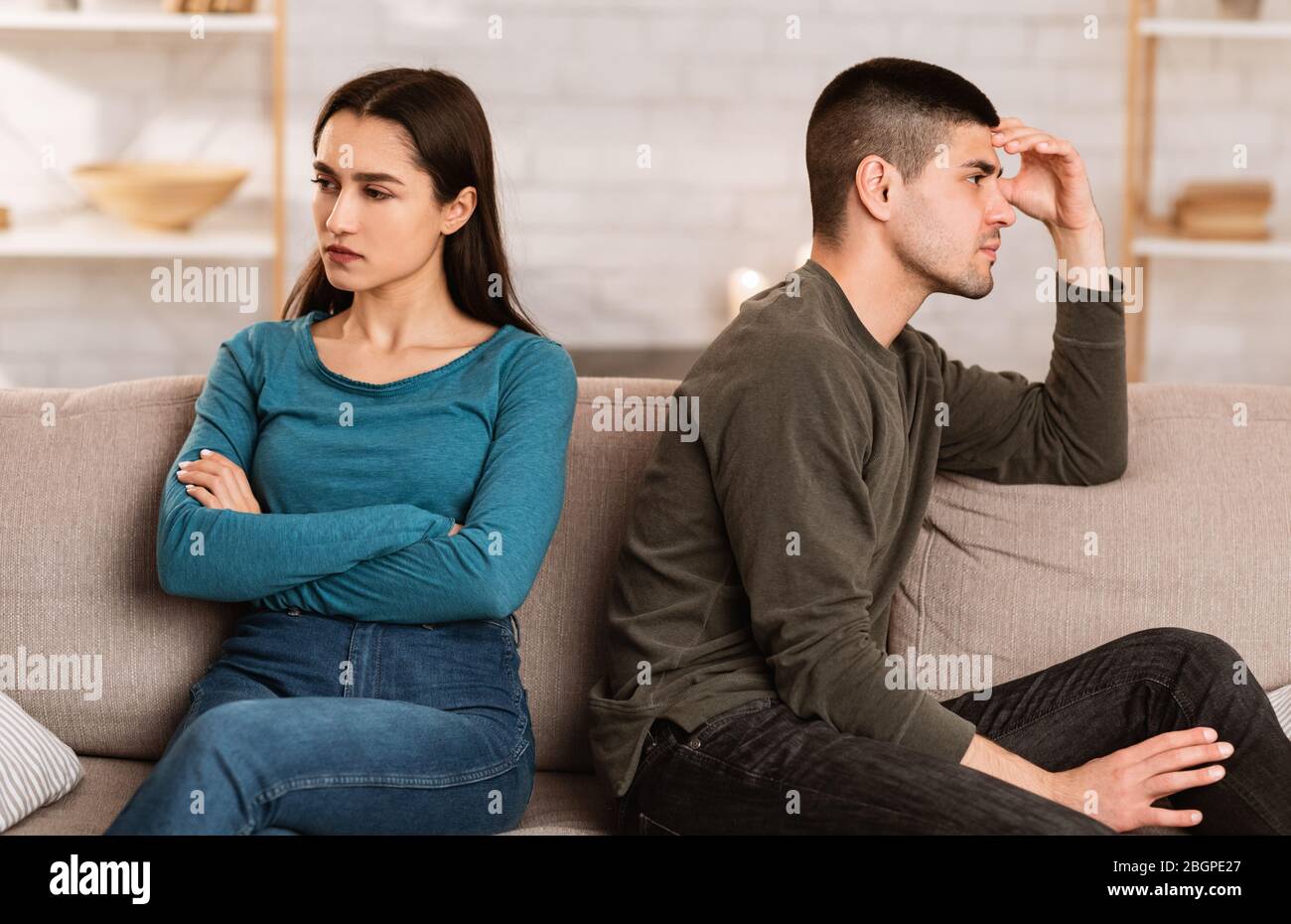 Couple ignoring each other after arguing during isolation Stock Photo ...