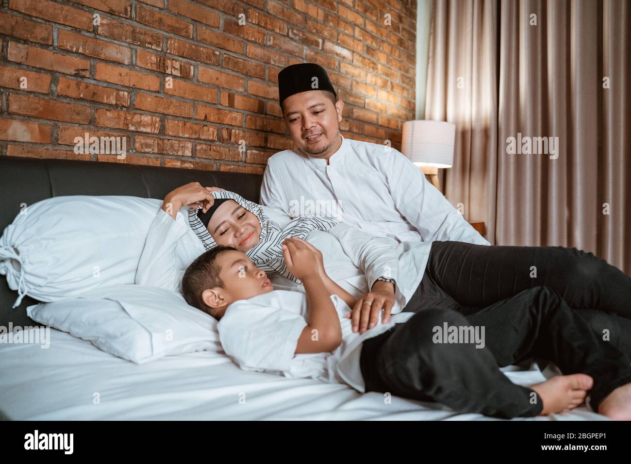 Malay family home muslim hi-res stock photography and images - Alamy