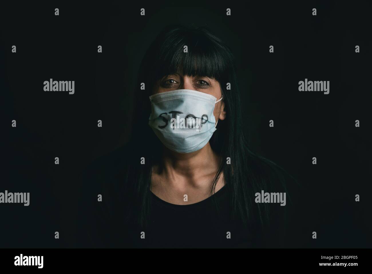 Stop Violence,scared woman wearing medical mask for coronavirus victim ...