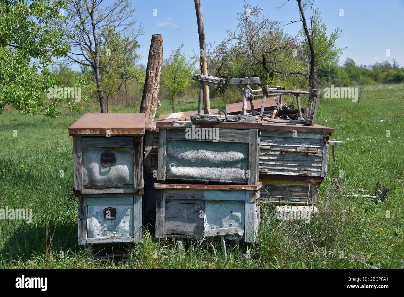Old beehives made of wood and rusty metal Stock Photo - Alamy