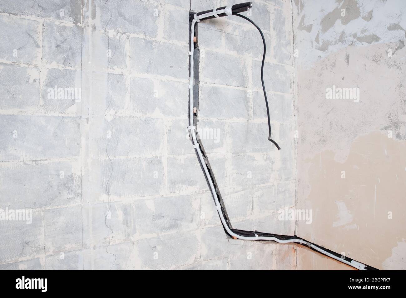 Installation of pipe channel for connecting air conditioner in concrete ...