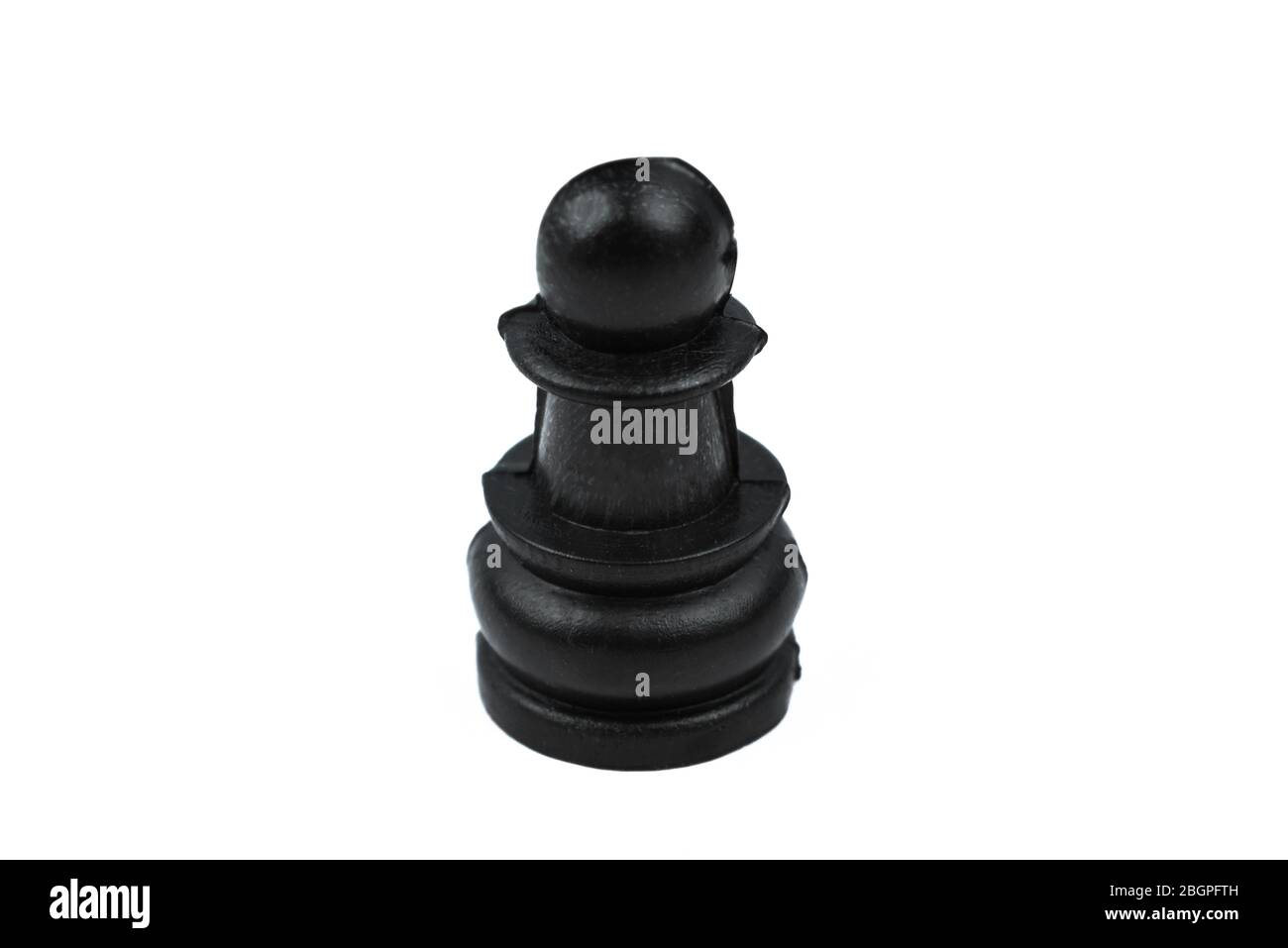 Black color simple pawn placed in a middle of the white isolated empty ...