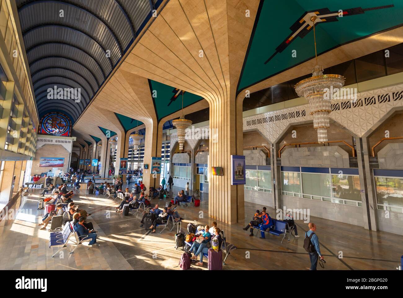Interior of Samarkand Railway station. Passengers waiting for the ...