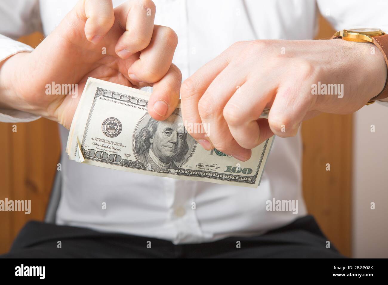 Businessman tear dollar banknote. Financial crisis concept Stock Photo ...