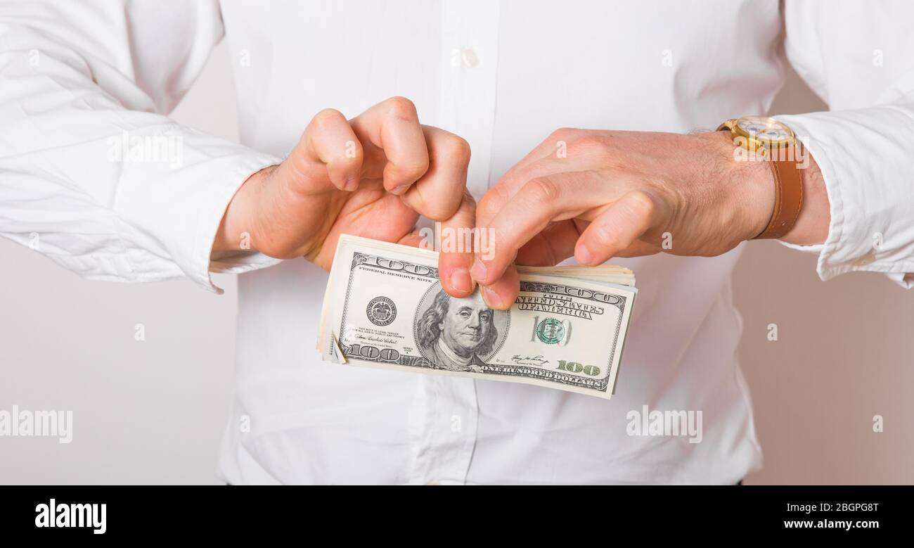 Businessman tear dollar banknote. Financial crisis concept Stock Photo ...