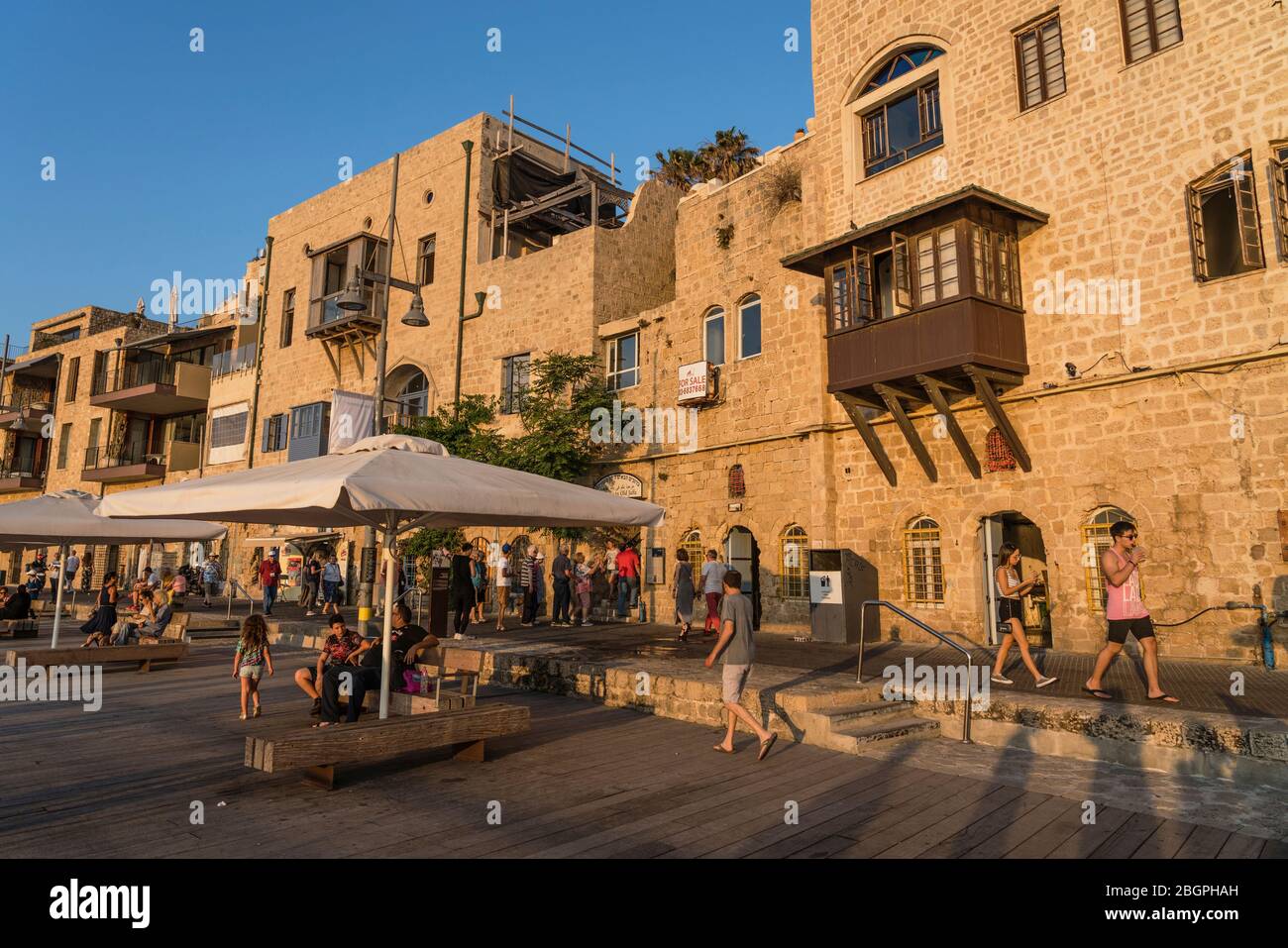Israel, Jaffa, Old Jaffa, Tourists on the promenade along the seafront ...