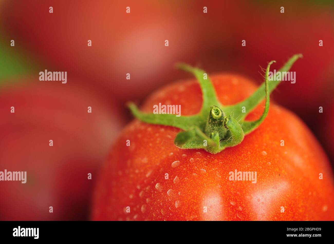 Detail intake nice fresh red tomato very tasty Stock Photo - Alamy