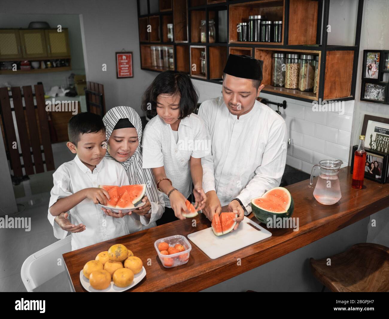 muslim asian family breaking the fast together Stock Photo - Alamy