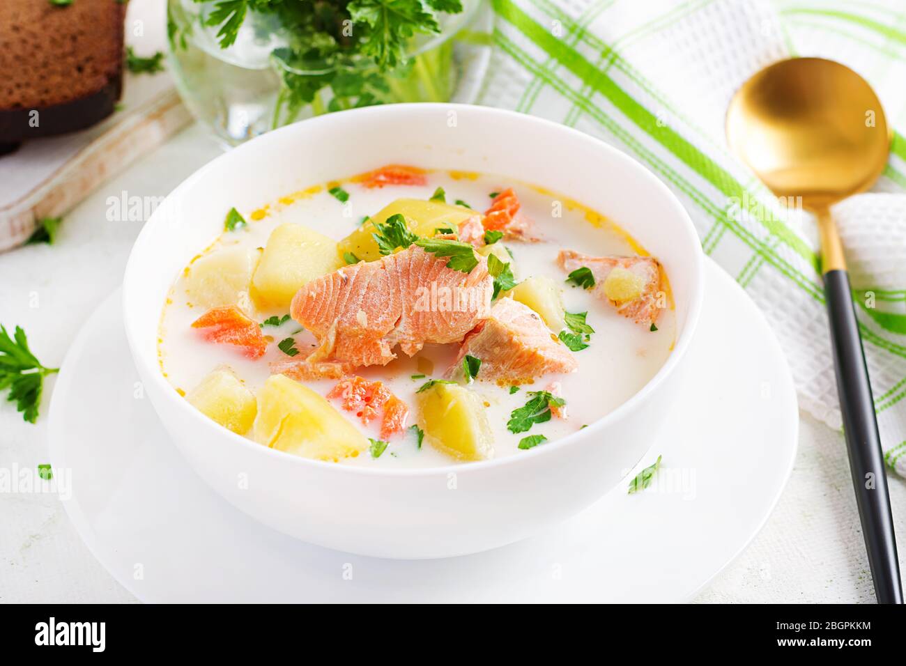 Kalakeitto. Creamy soup with salmon, potatoes, onions and carrots and ...