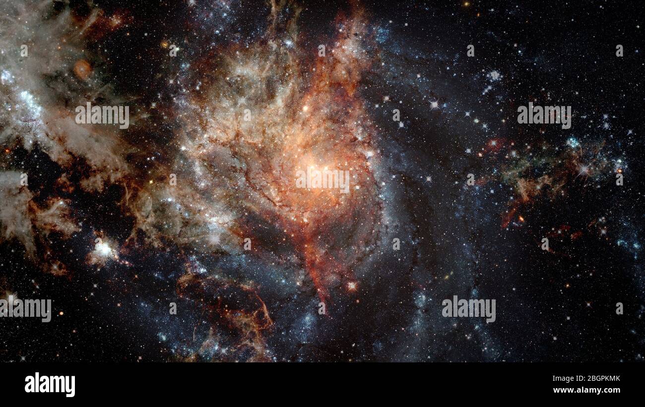 Giant spiral disk of stars, dust and gas. Elements of this image ...