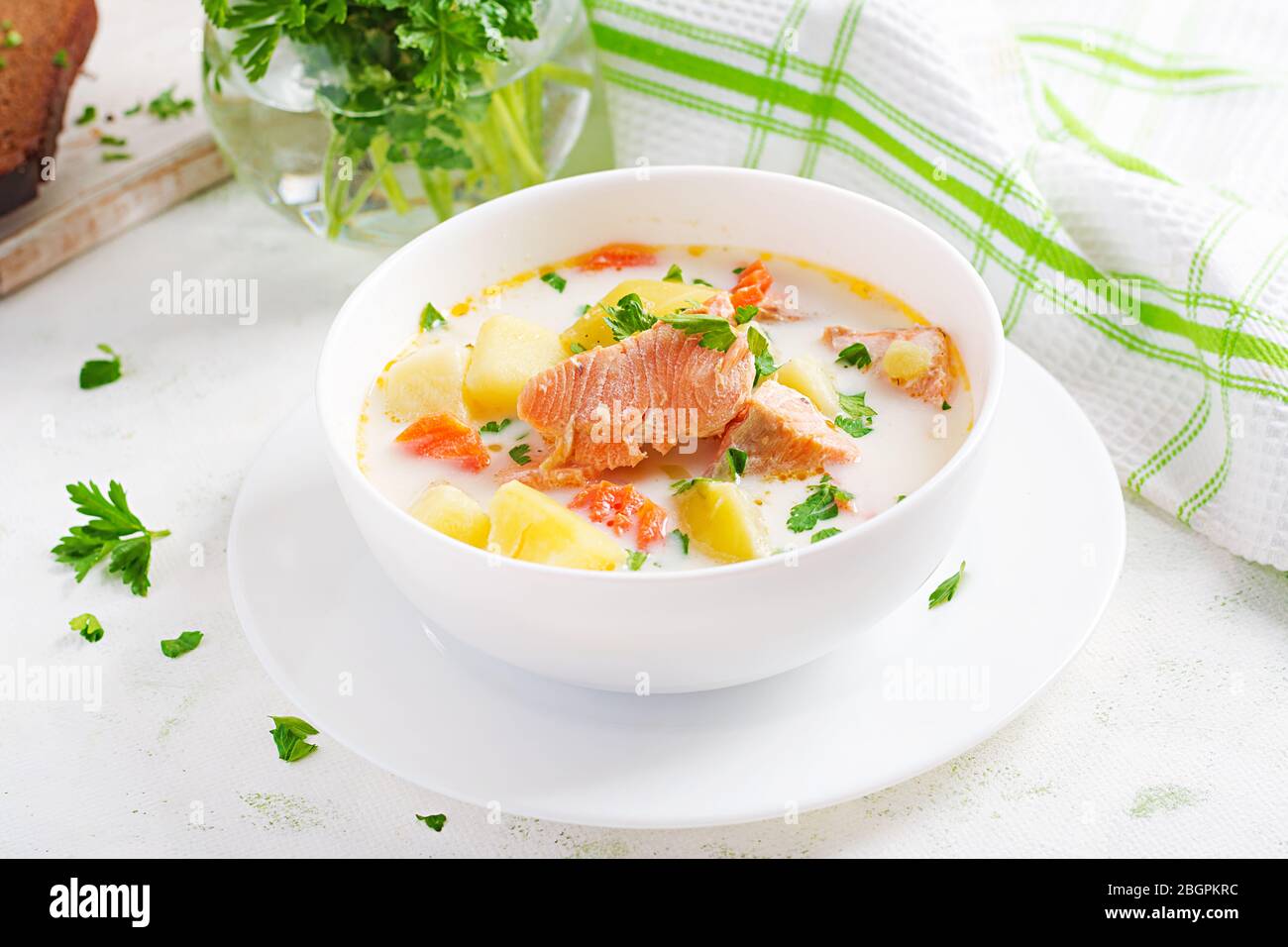 Kalakeitto. Creamy soup with salmon, potatoes, onions and carrots and ...