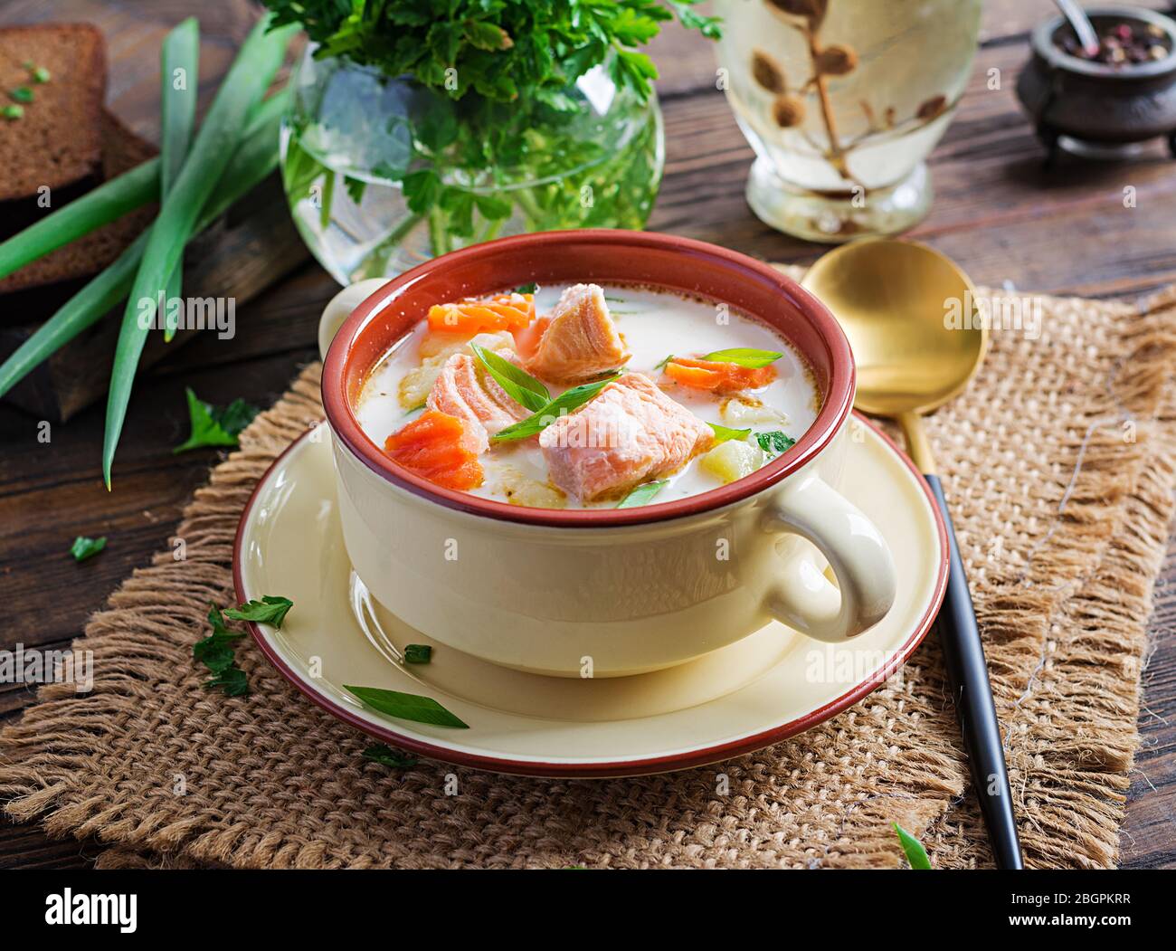 Kalakeitto. Creamy soup with salmon, potatoes, onions and carrots and ...
