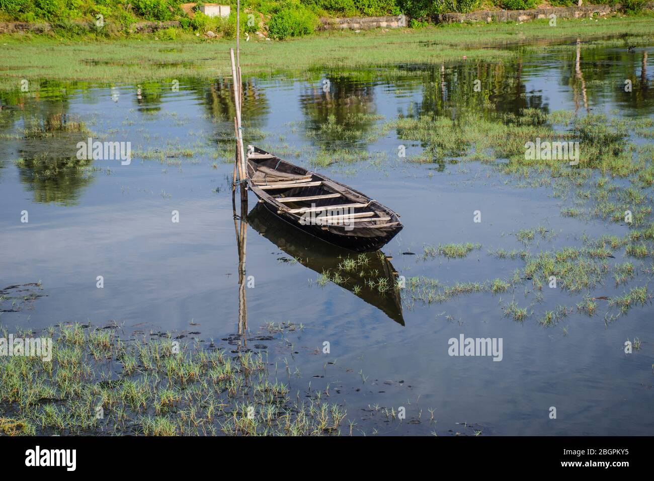 Lonely boat sunset tropical nature hi-res stock photography and images ...