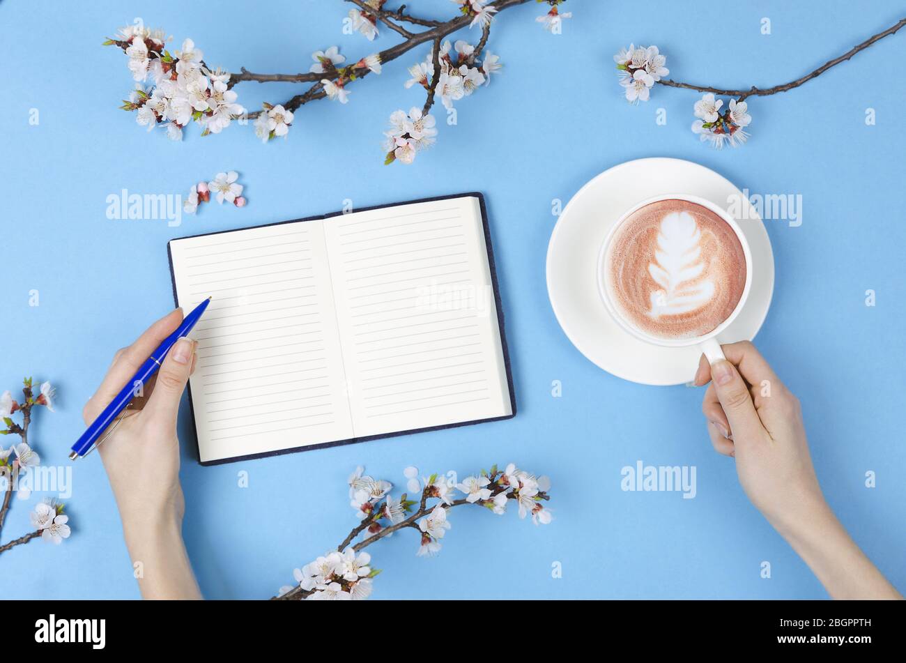 Wish list for future plans. flat lay composition with flowers, glasses ...