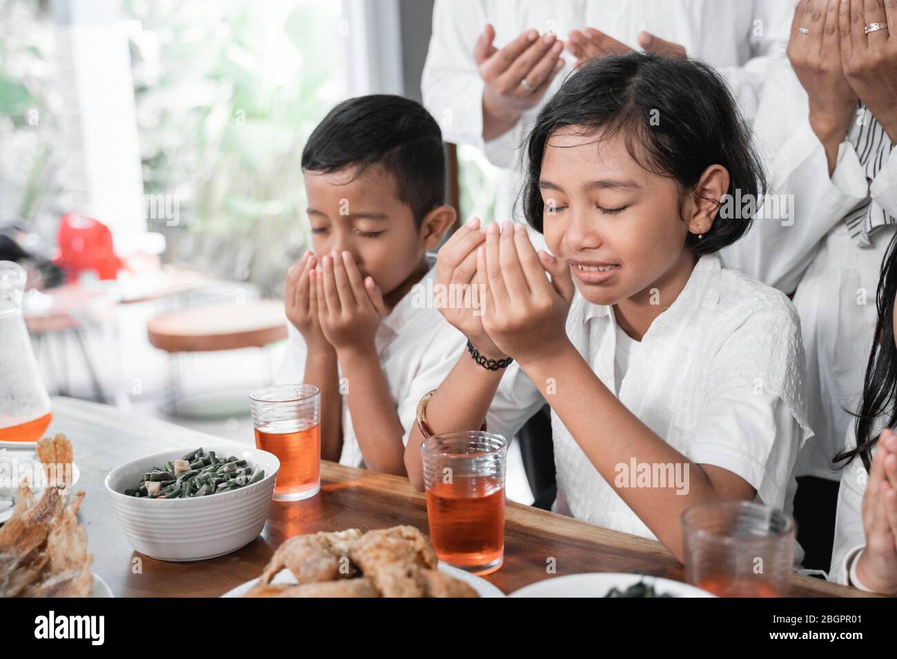 asian children pray muslim open arm before eating dinner Stock Photo ...