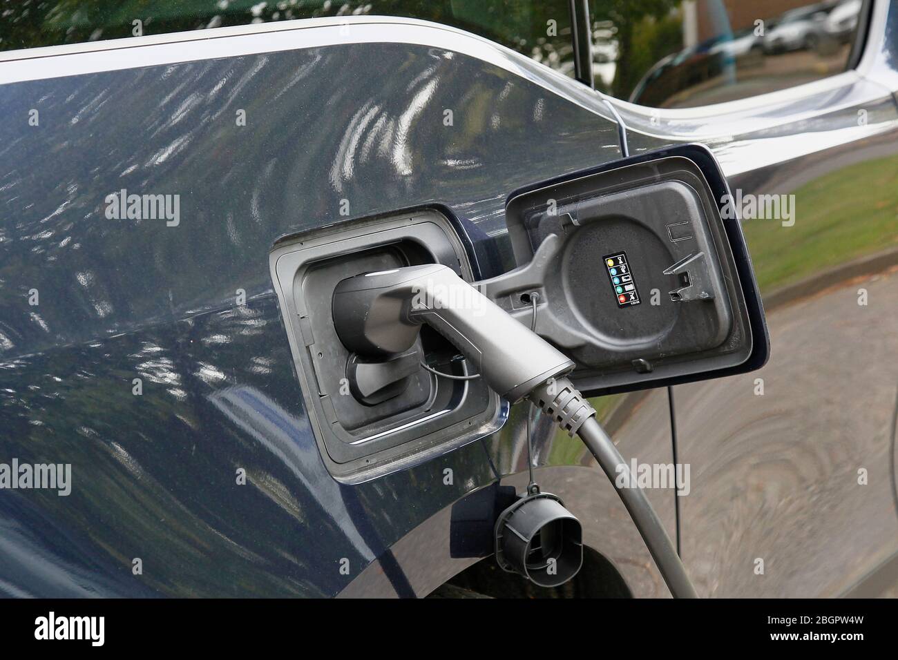 Transport, Cars, Electric, Vehicle plugged into recharge point Stock ...