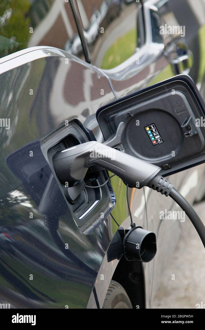 Transport, Cars, Electric, Vehicle plugged into recharge point Stock ...