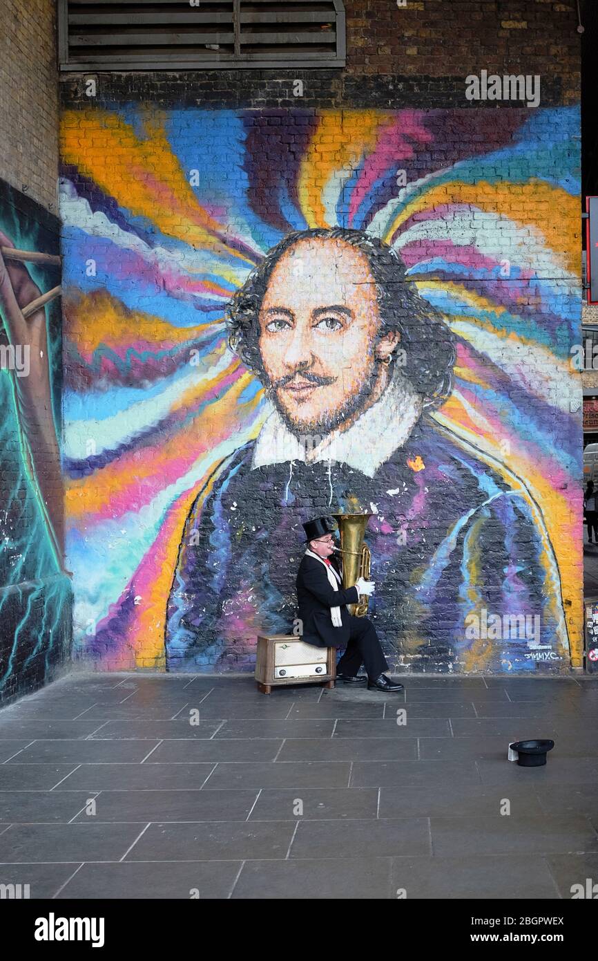 England, London, Southwark, Tuba playing busker in front of William ...
