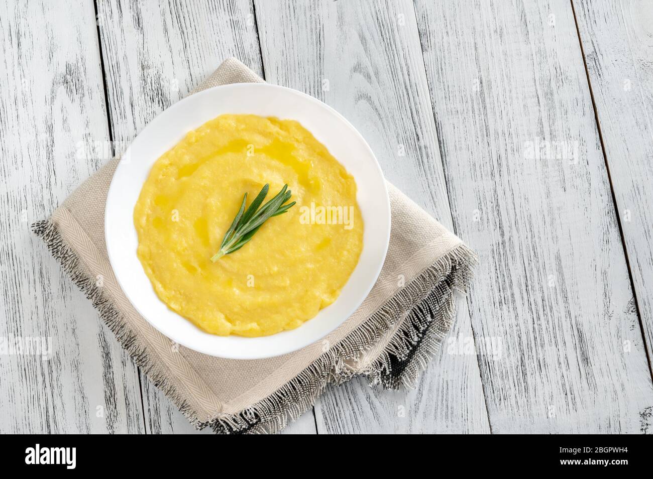 Italian traditional polenta, a dish of boiled cornmeal Stock Photo - Alamy