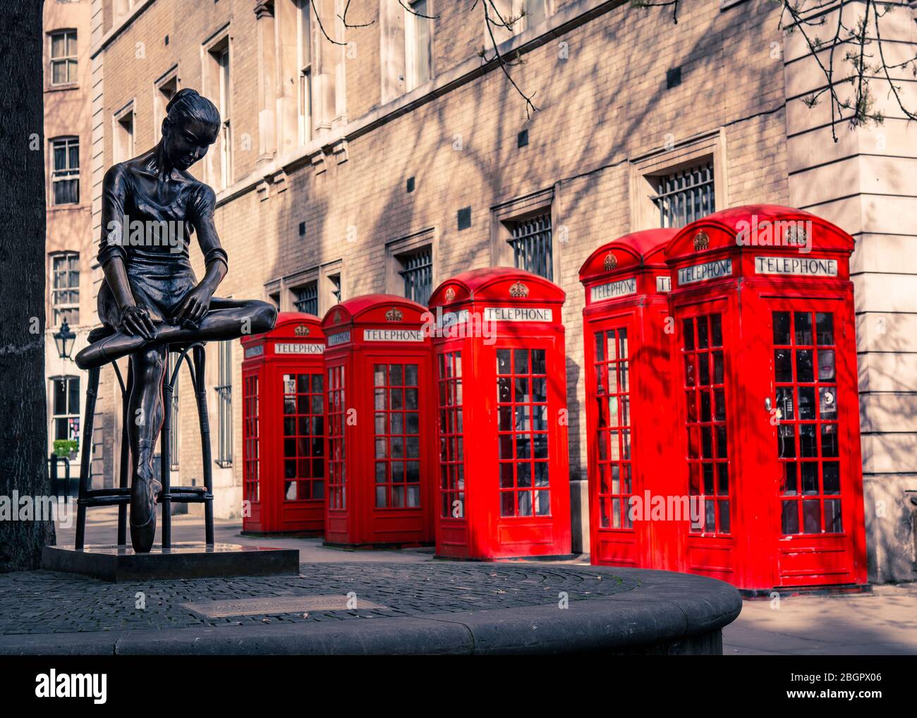 LONDON- A row of London red telephone boxes in Covent Garden area of ...